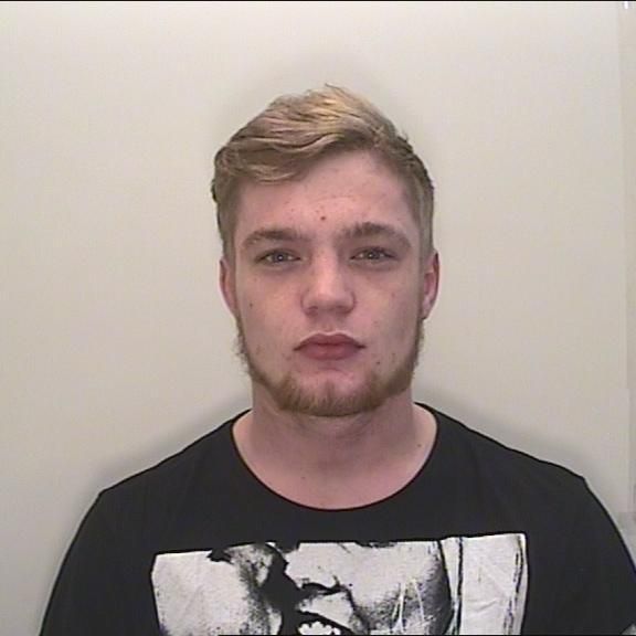 Wanted man arrested on suspicion of robbery
